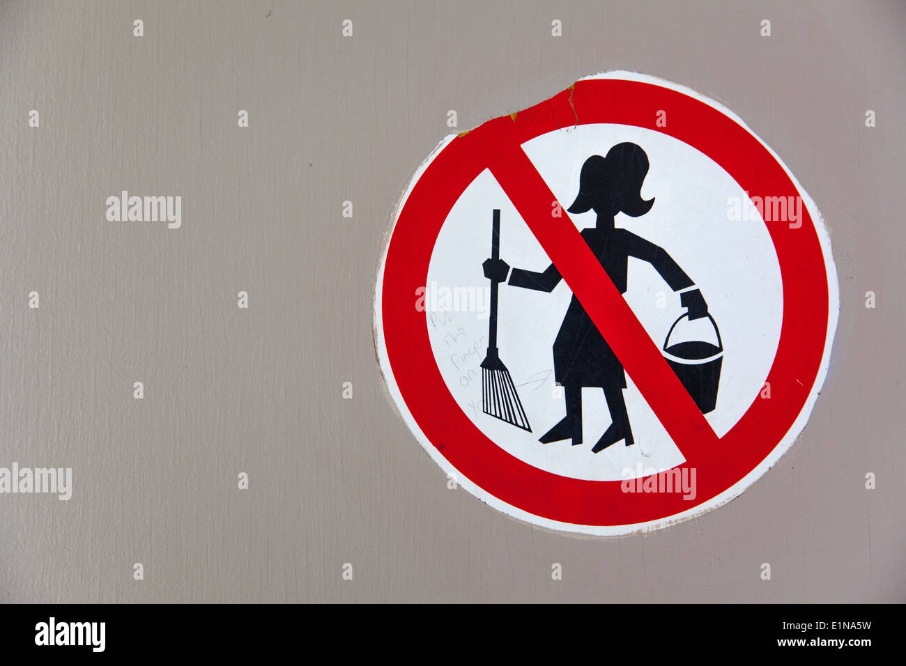 Cleaning person symbol from a previous generation Stock Photo - Alamy