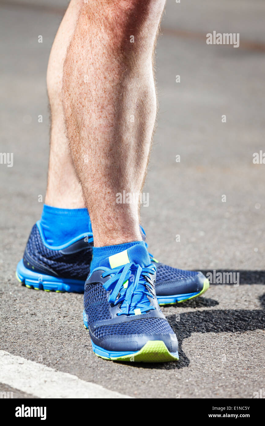 Male runner feet blue hi-res stock photography and images - Alamy