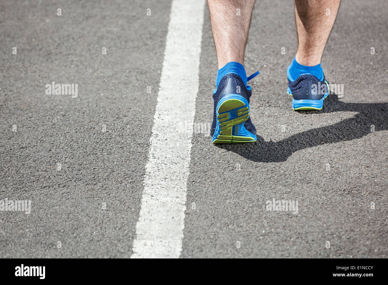Man running stadium hi-res stock photography and images - Alamy
