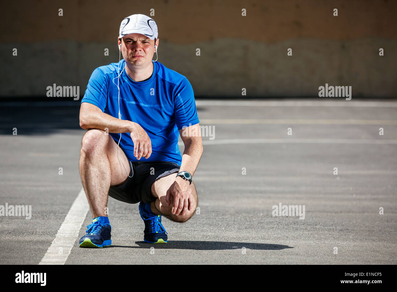 Runner at the start hi-res stock photography and images - Alamy