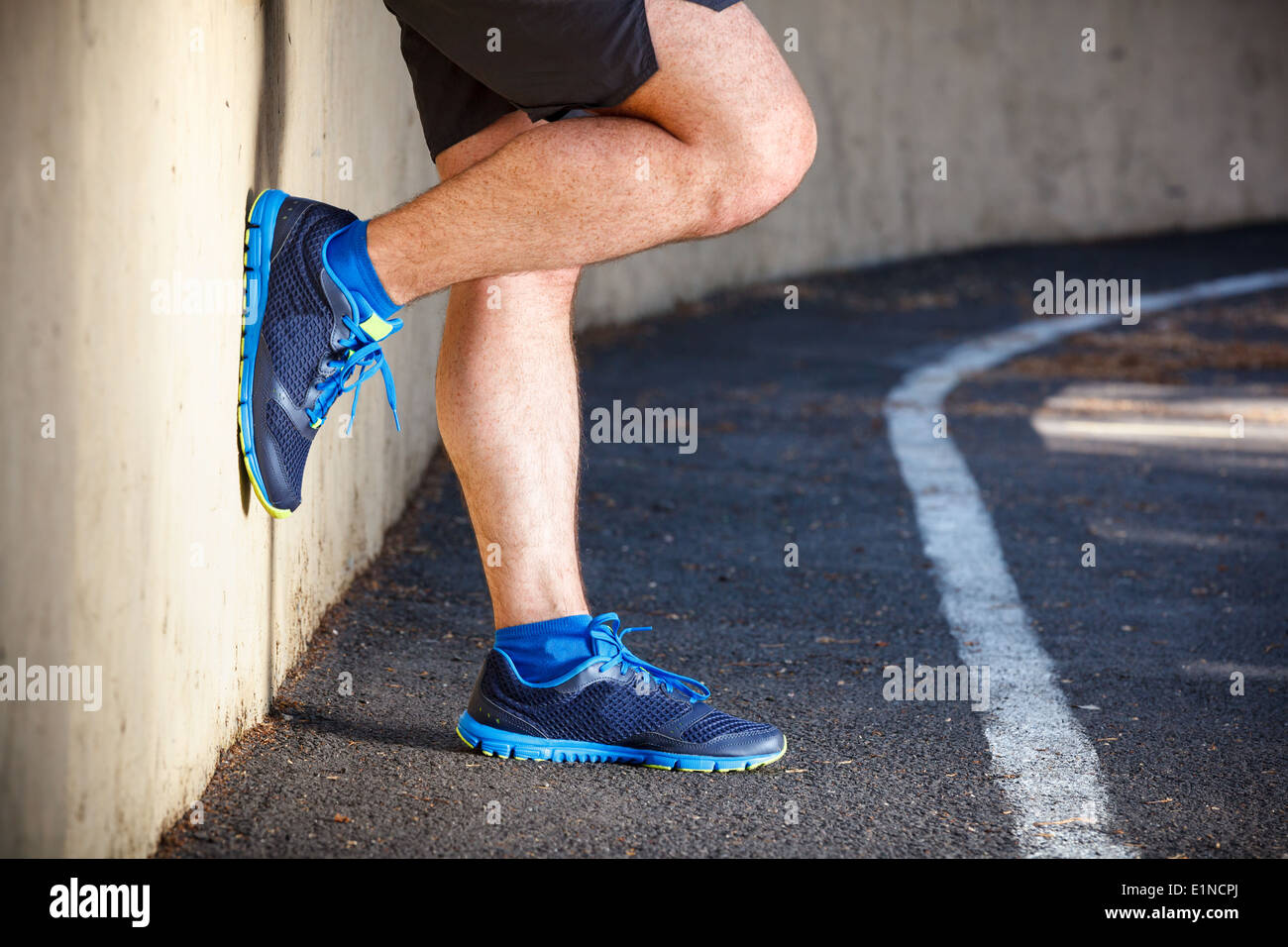 Fitness wall leaning man hi-res stock photography and images - Alamy