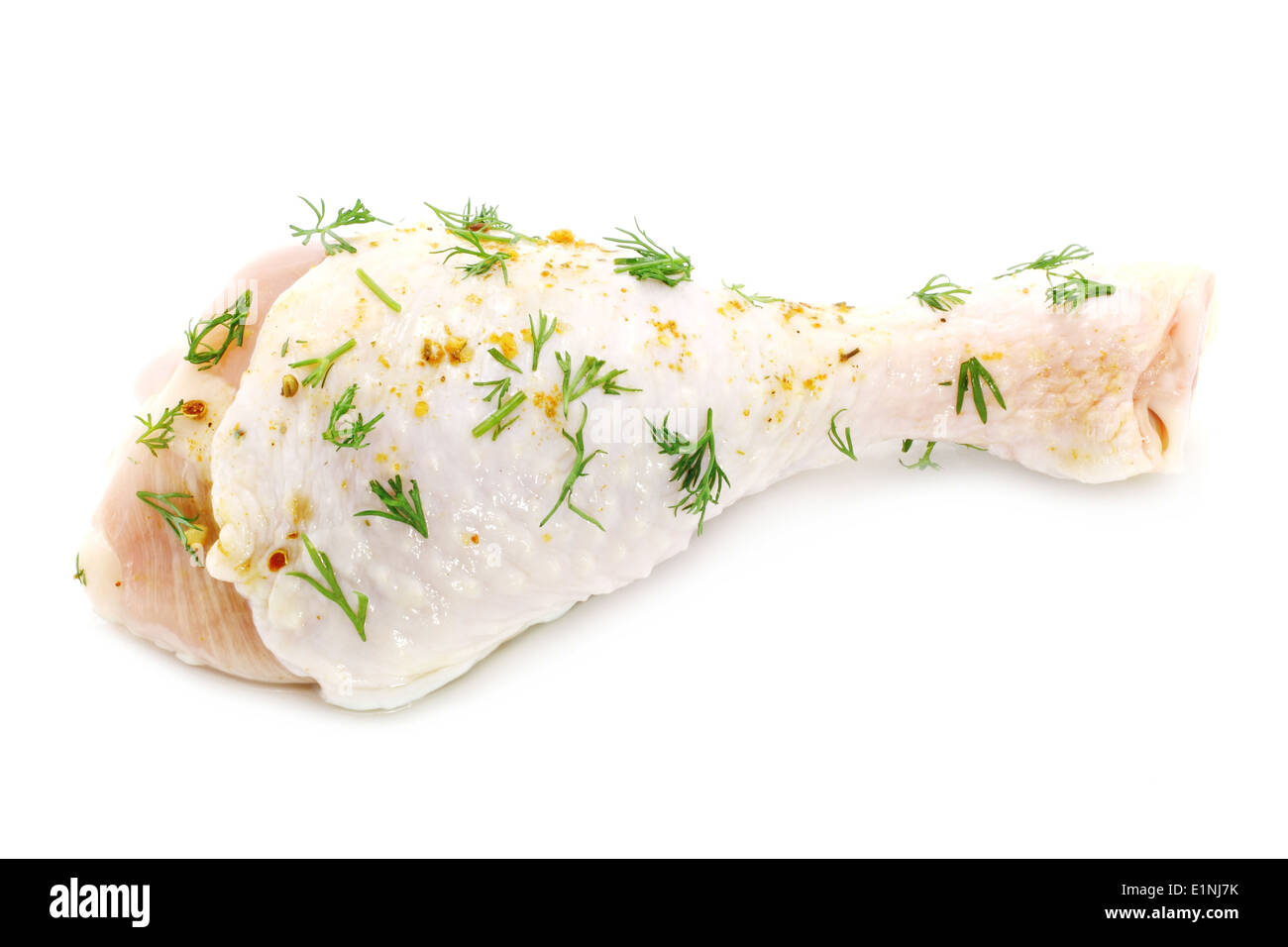 Raw chicken leg on a white background Stock Photo - Alamy