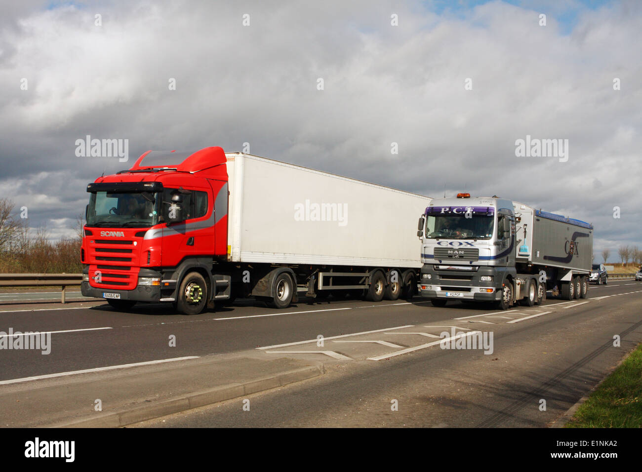 Two trucks traveling along the A46 dual carriageway in Leicestershire ...