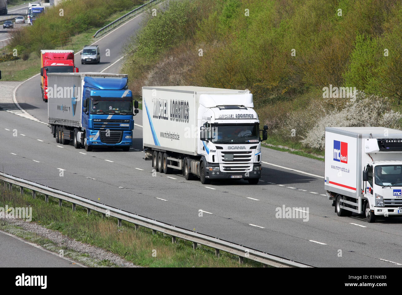 Trucks traveling along the M20 motorway in Kent, England Stock Photo ...