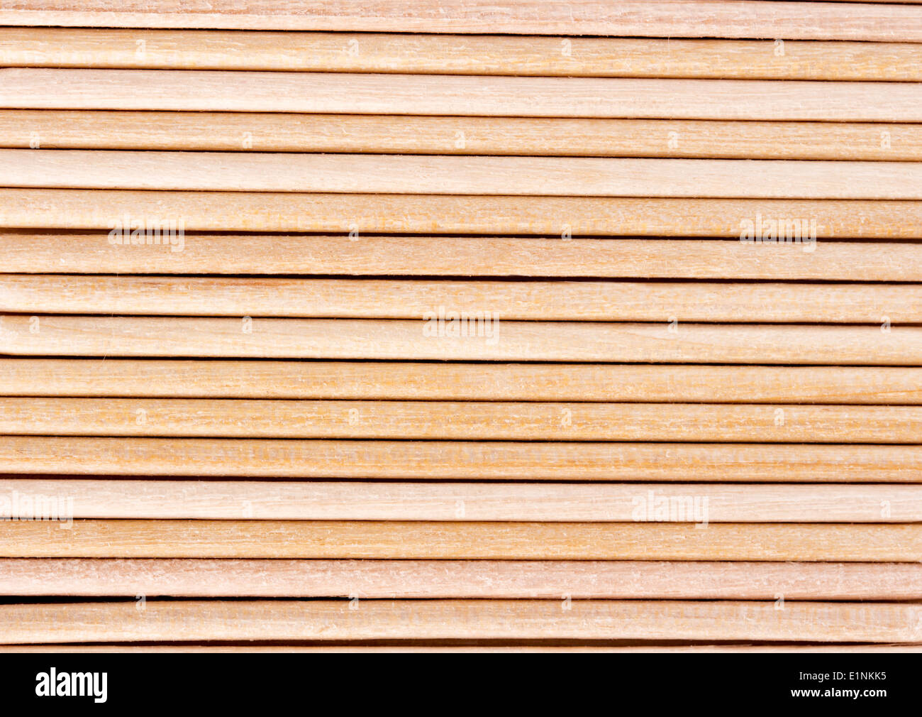 Wooden toothpicks background image, closeup Stock Photo - Alamy