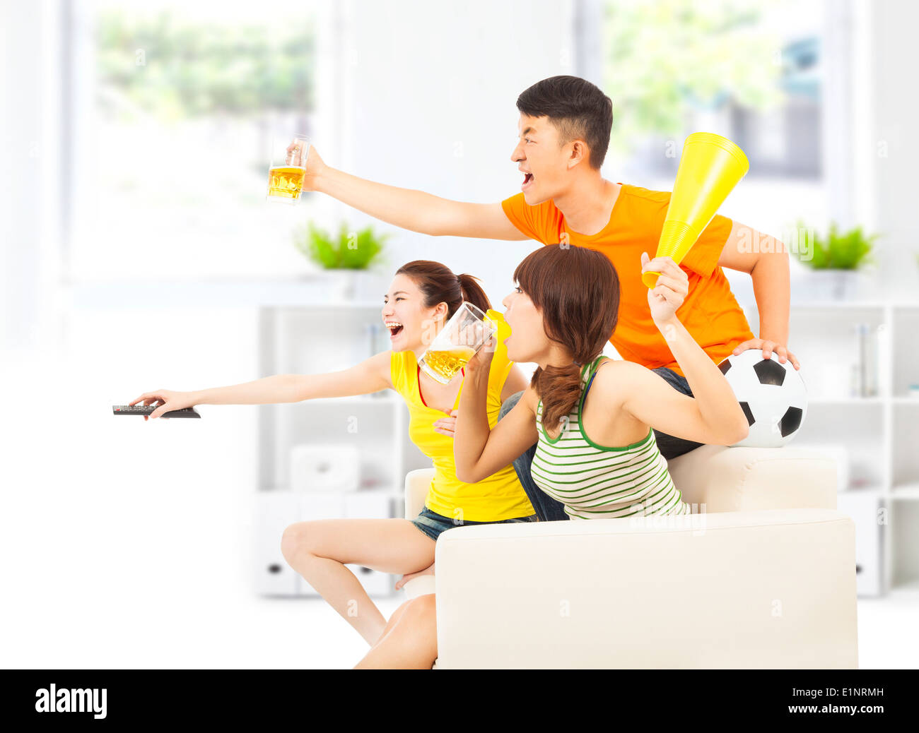 young people so excited to yelling and while watching soccer game Stock ...