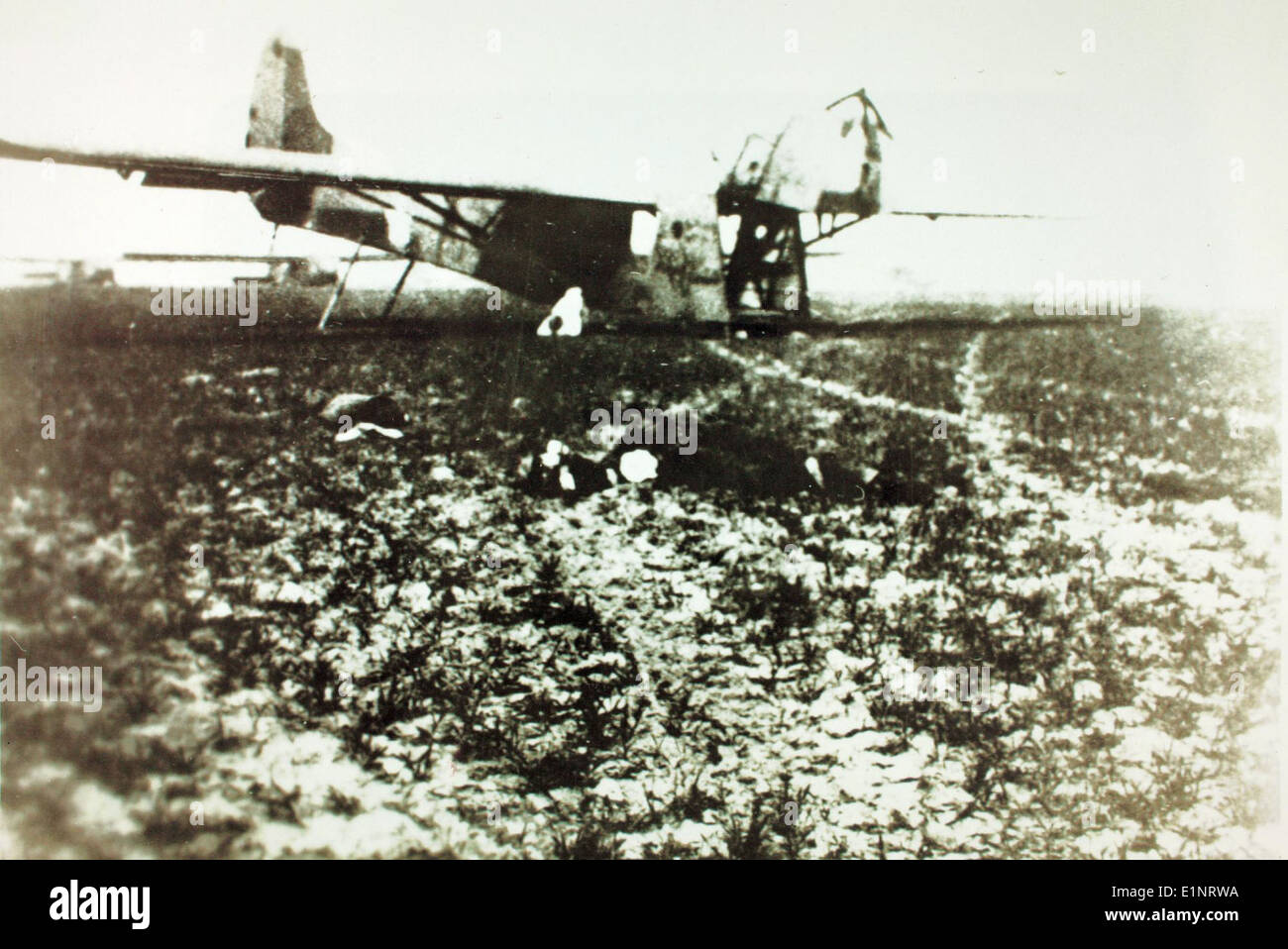 This image documents a 1940s aircraft accident involving a WACO CG-4A ...