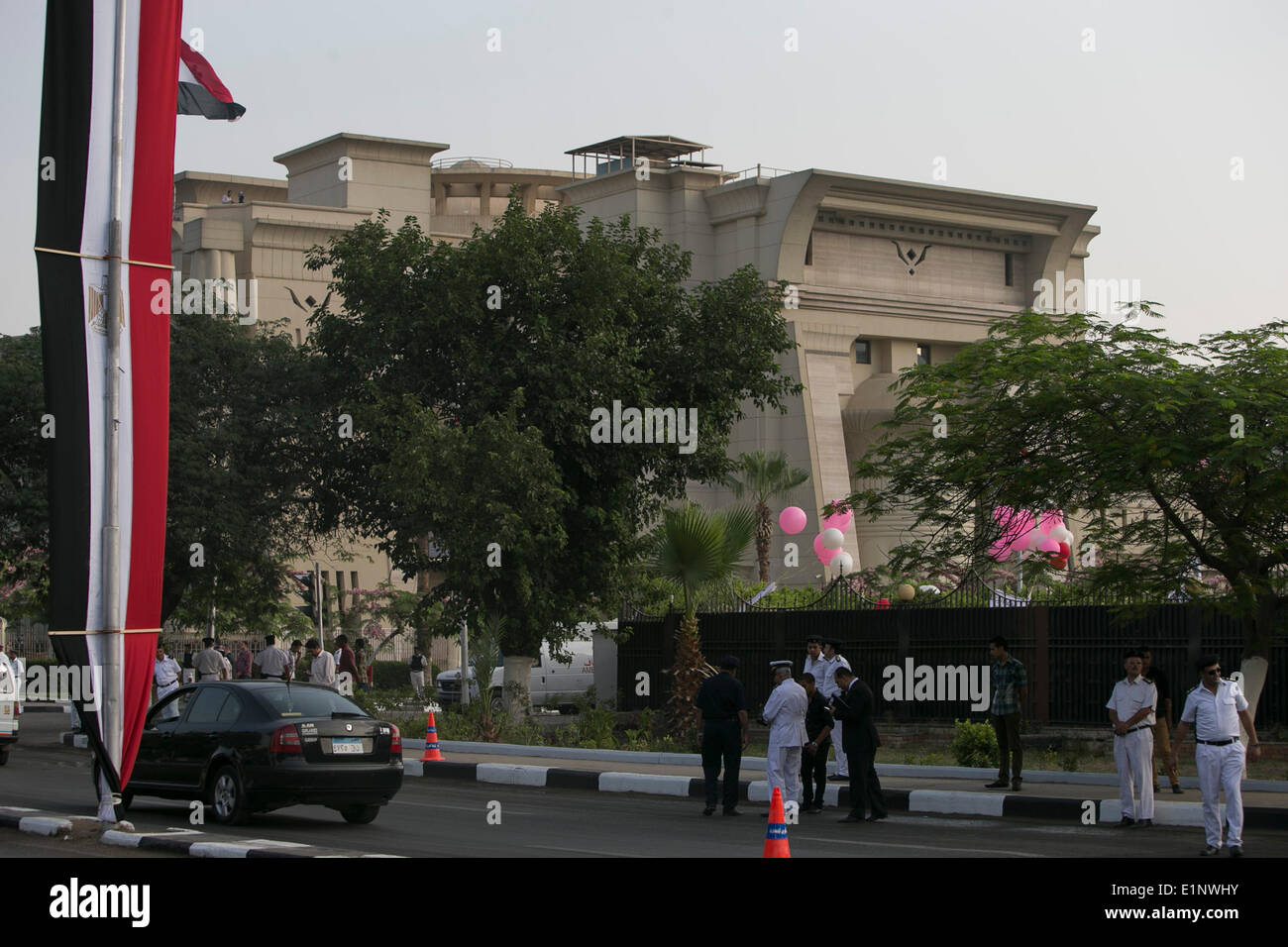 Cairo, Egypt. 8th June, 2014. Security members stand guard in front of ...