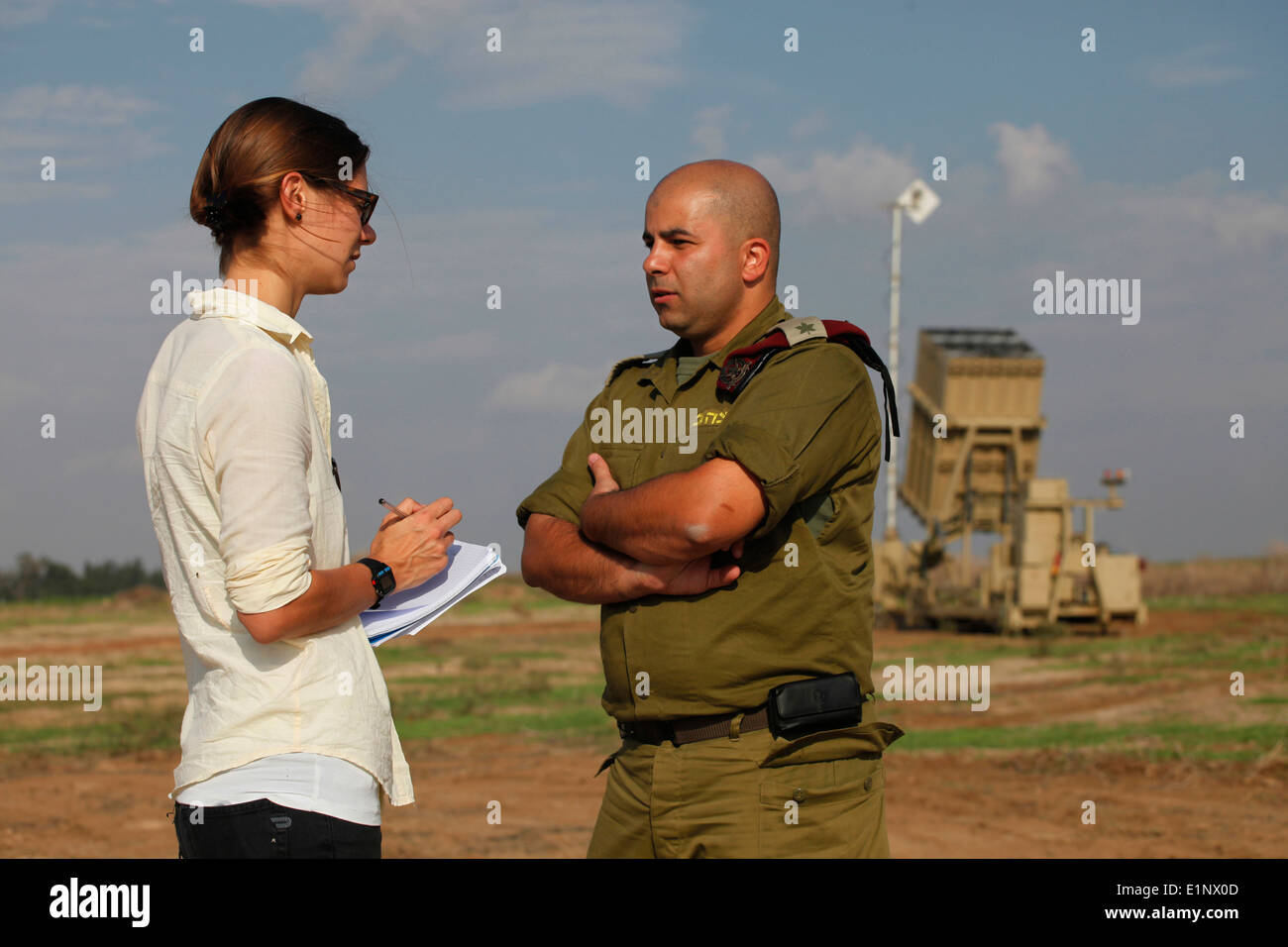 A German reporter interviews Major Aryeh Shalikar, a spokesman for the ...