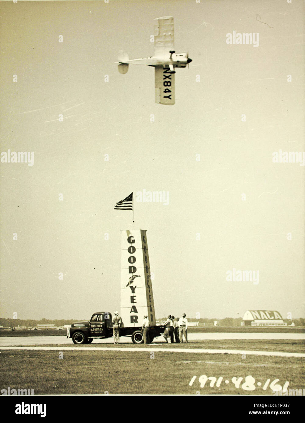 This image captures a thrilling moment from the National Air Races held ...