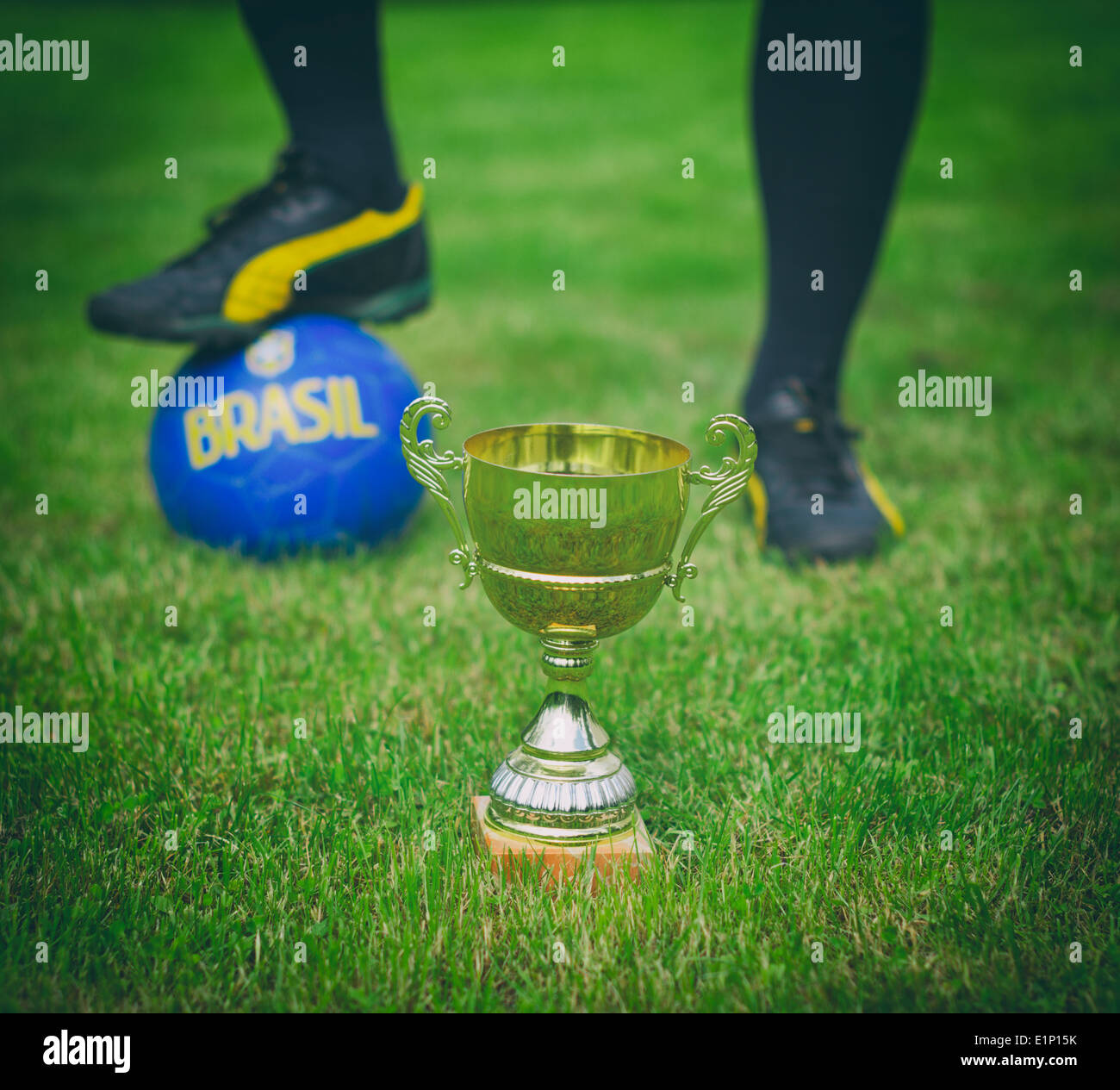 Football player trophy hi-res stock photography and images - Alamy