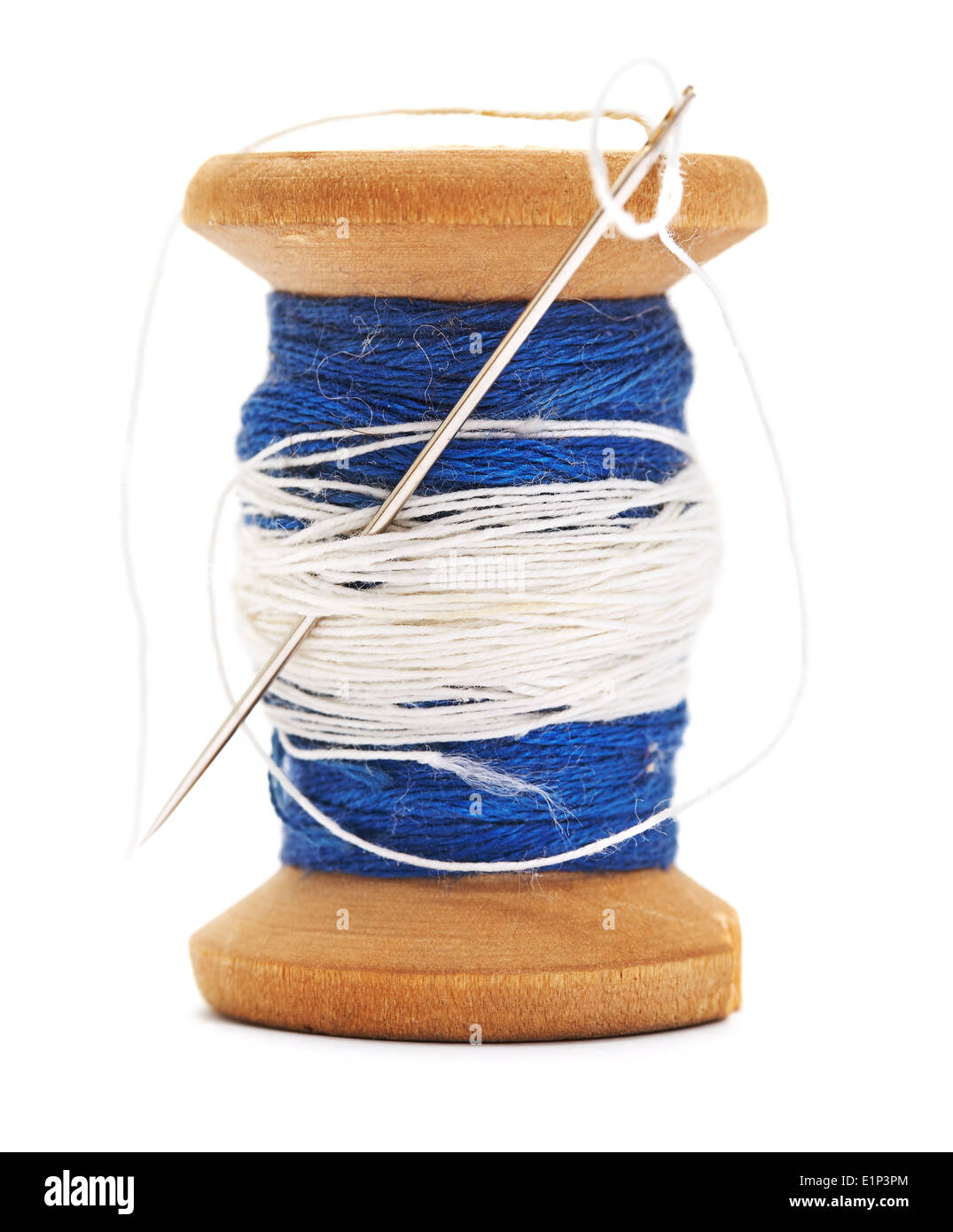 spool of thread on a white background Stock Photo - Alamy