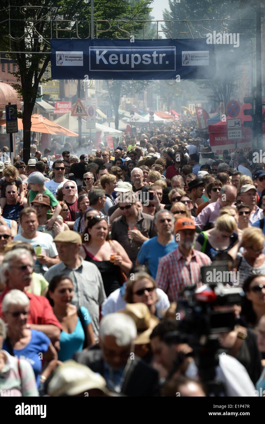 Cologne, Germany. 08th June, 2014. Numerous people wakl through the ...
