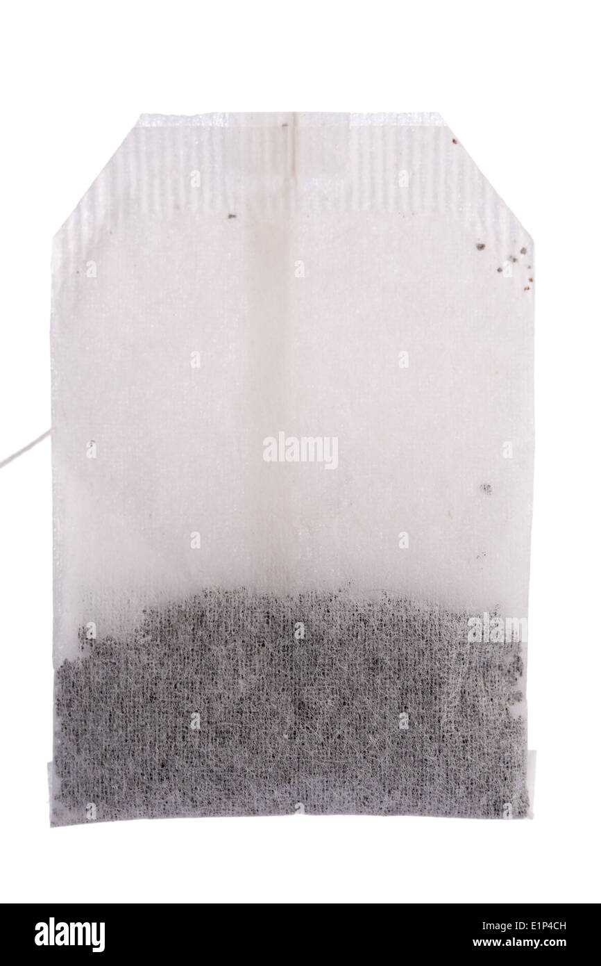 Teabag with yellow label, isolated on white background Stock Photo - Alamy