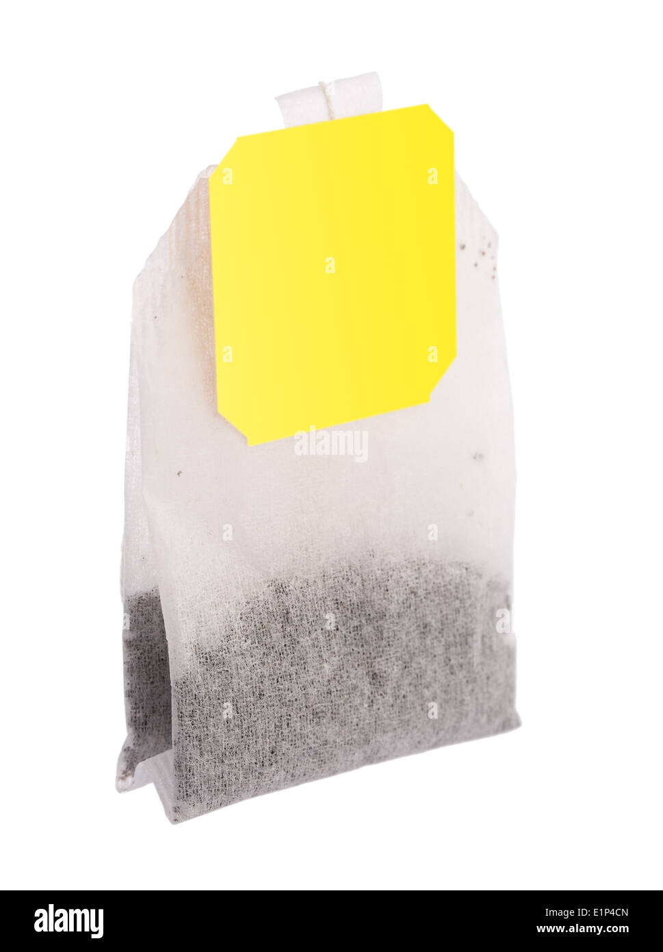 Teabag with yellow label, isolated on white background Stock Photo - Alamy