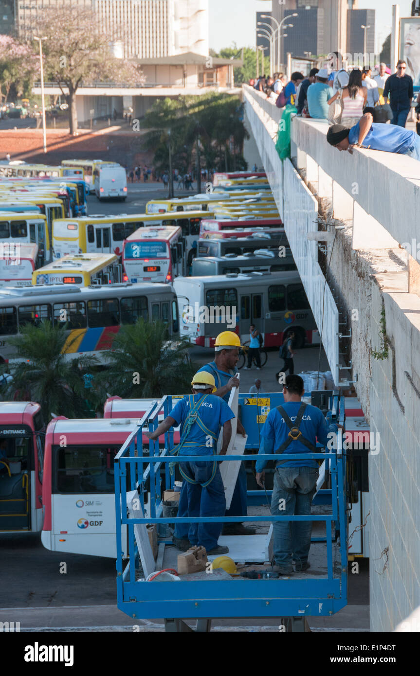 Workers repairing infrastructure in Brasilia center Stock Photo - Alamy