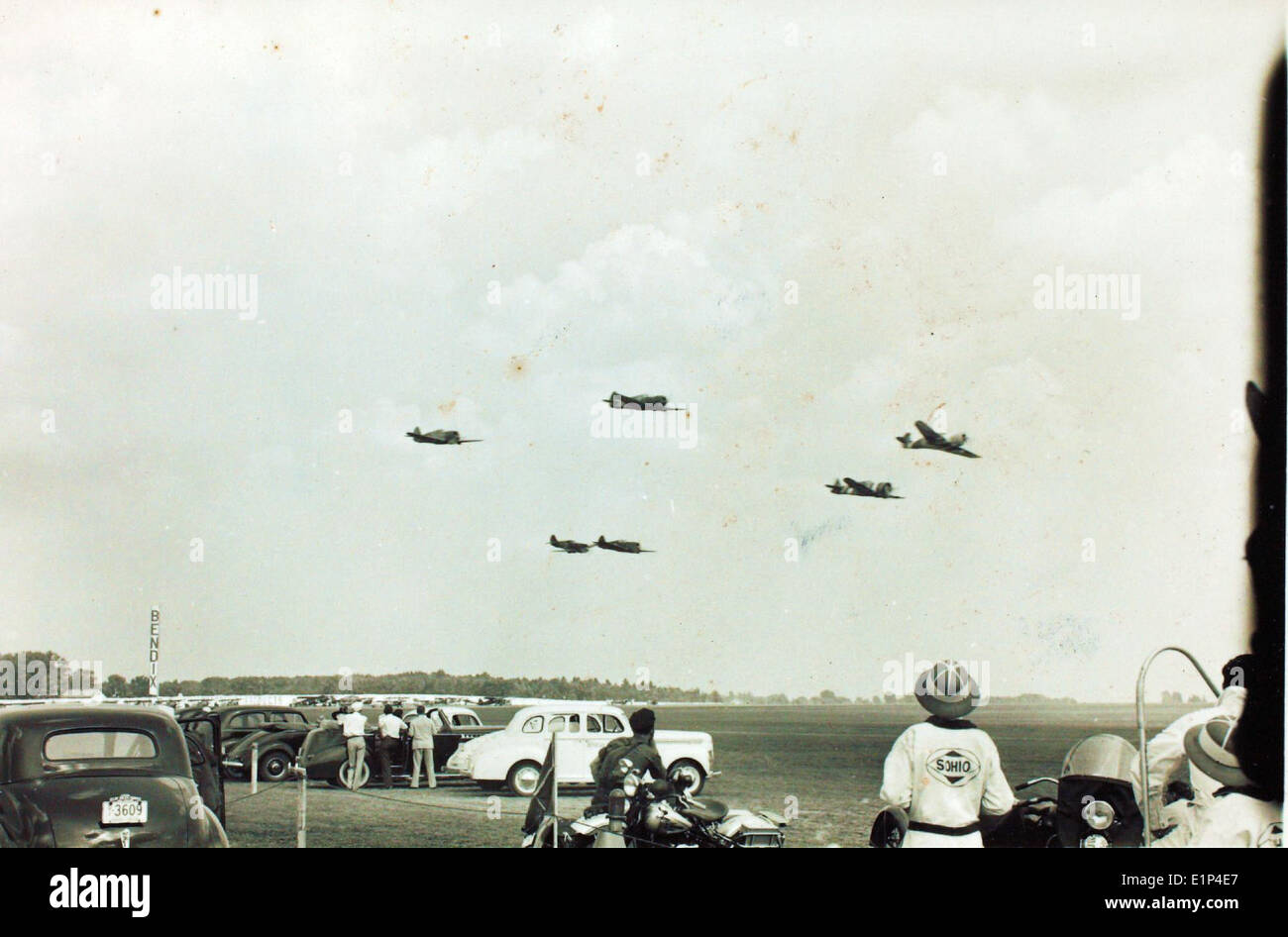 This image captures a series of historic flight formations, showcasing ...