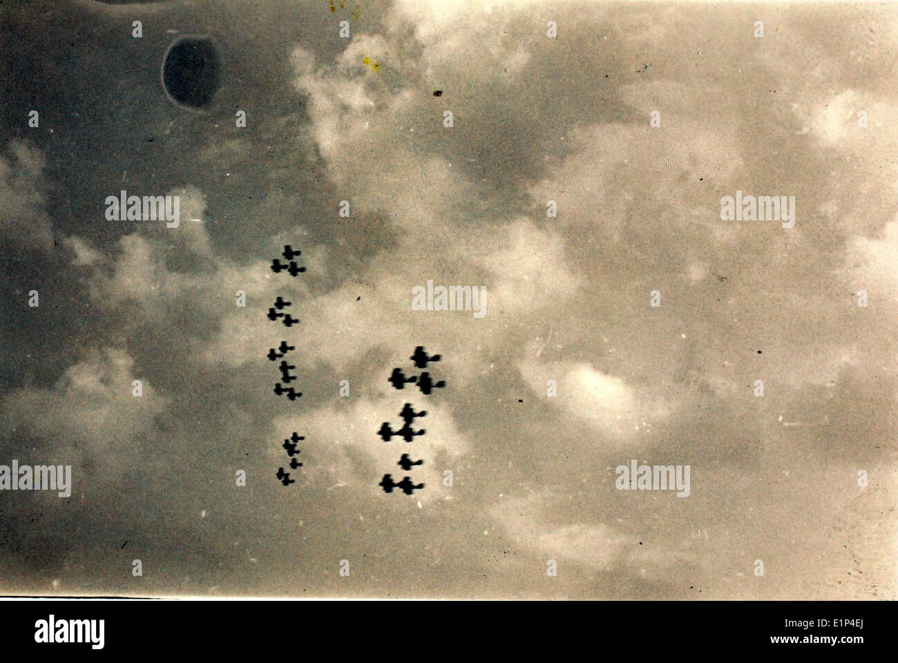 This image captures a historic flight formation, showcasing the ...