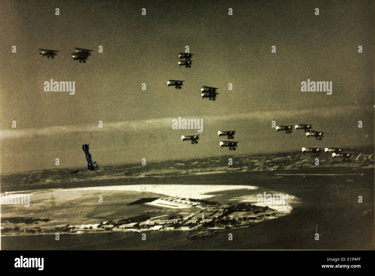 This image captures a historic flight formation, showcasing the ...