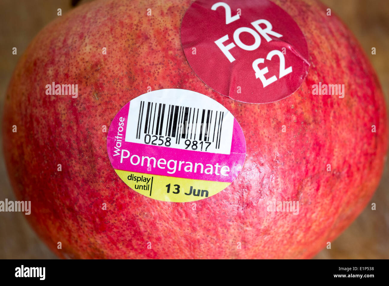 Product bar code and price offer on Pomegranate Stock Photo - Alamy