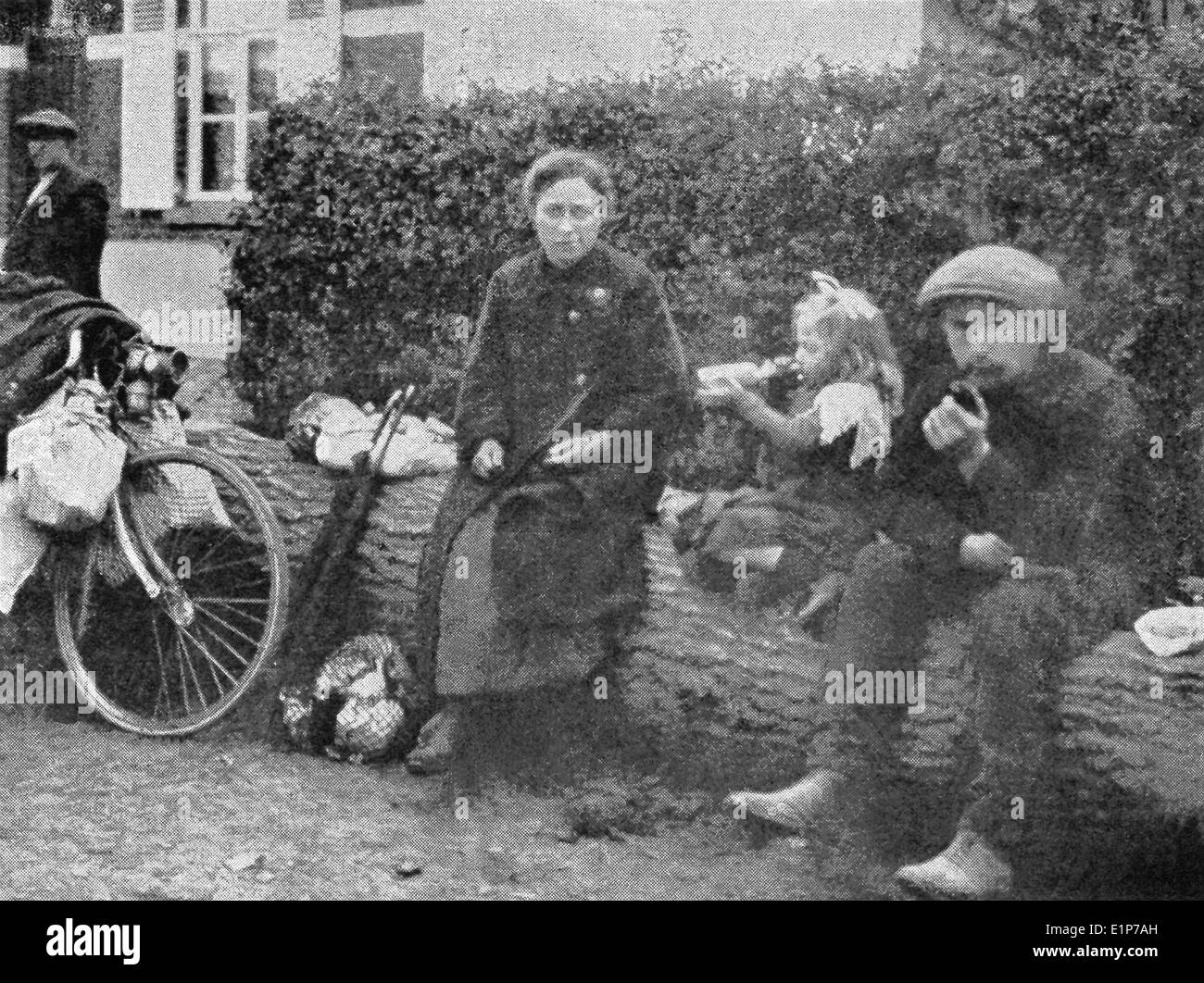 This contemporary photo shows a Belgium family, made homeless during ...