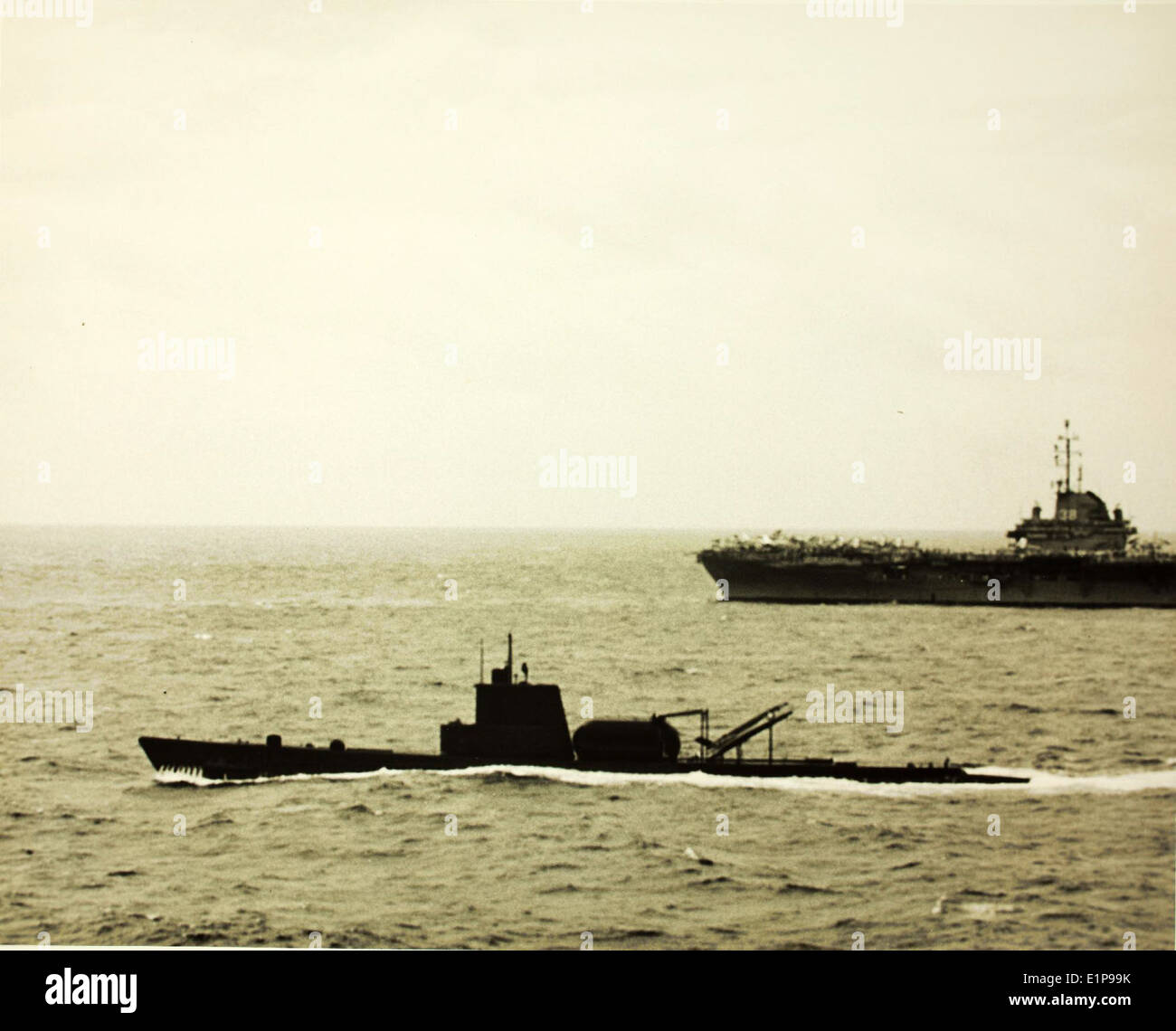 This image shows an aircraft carrier in action during Anti-Submarine ...