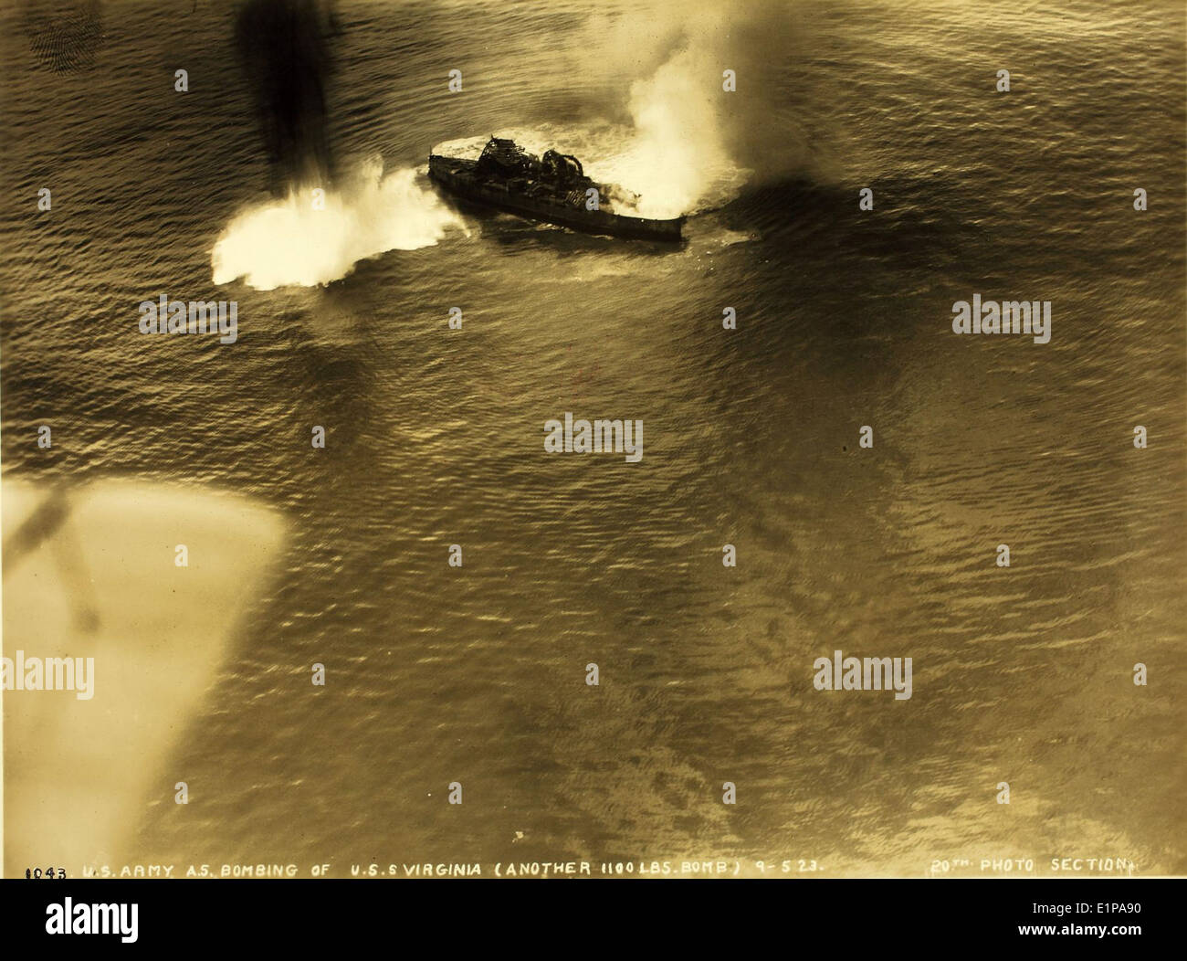 This image from the 1920s shows aerial bombing tests on ships ...