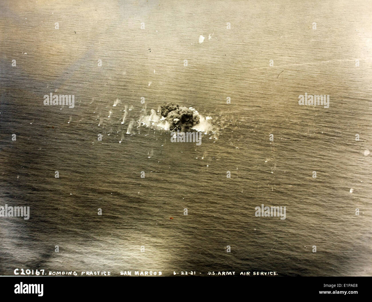 This photograph documents aerial bombing tests conducted on ships in ...