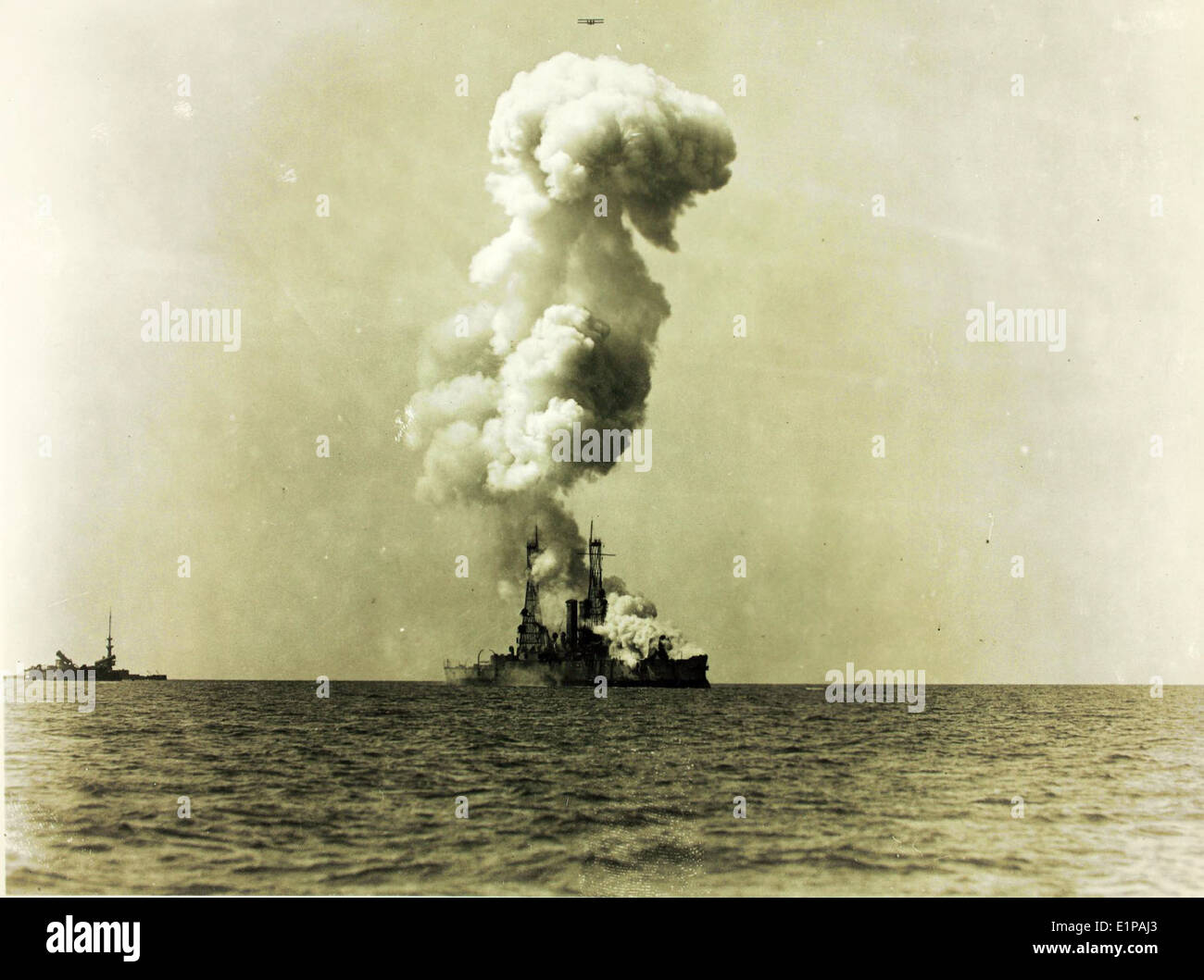 This image captures aerial bombing tests conducted on ships in the ...