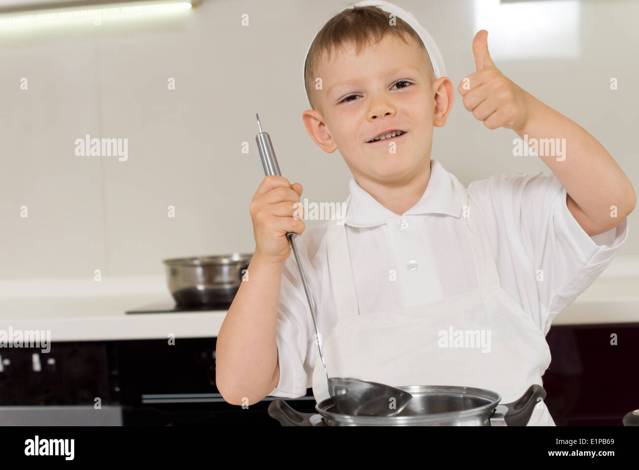 Child wry smile hi-res stock photography and images - Alamy