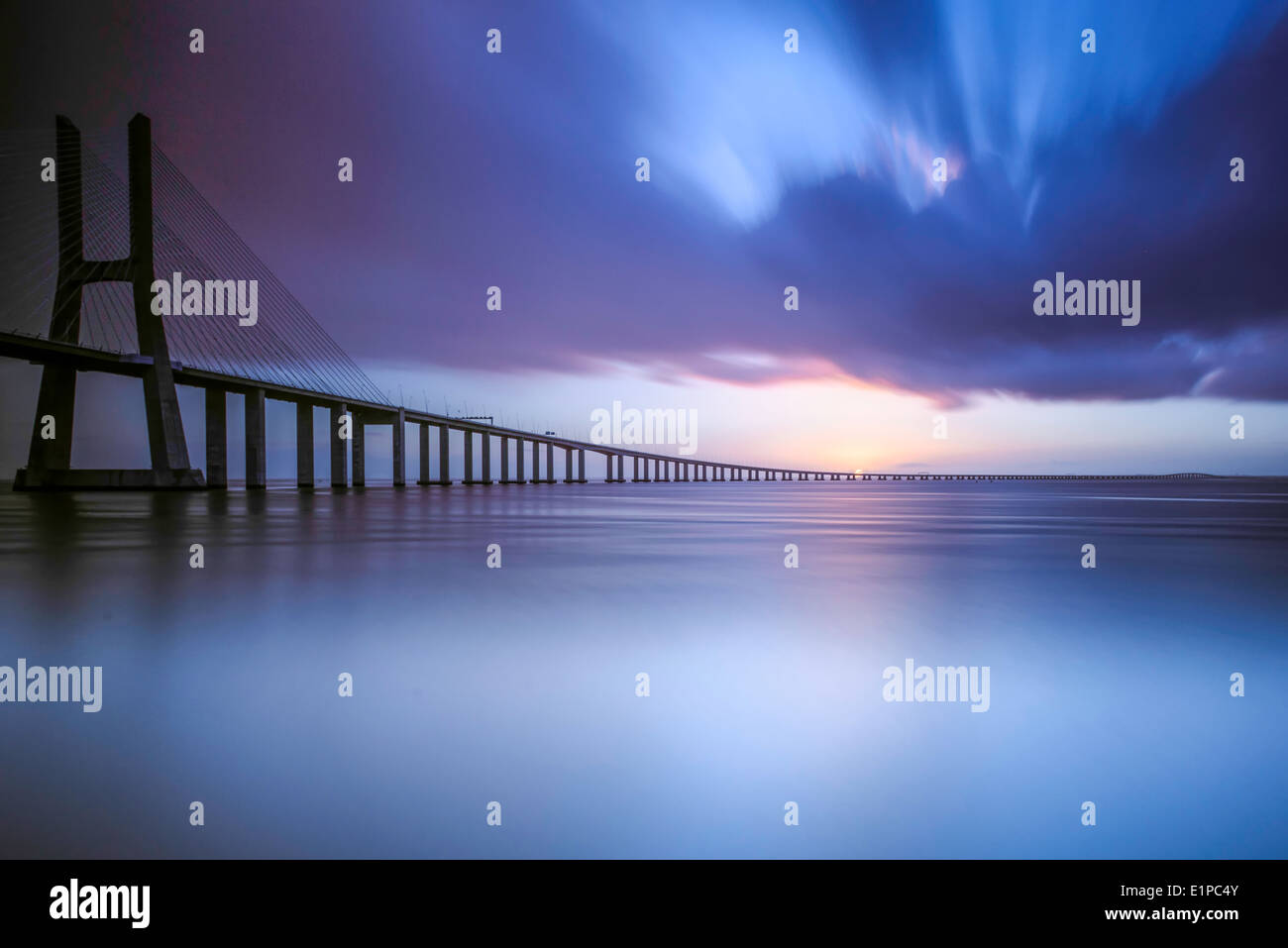 Dawn in Vasco da Gama bridge Stock Photo - Alamy
