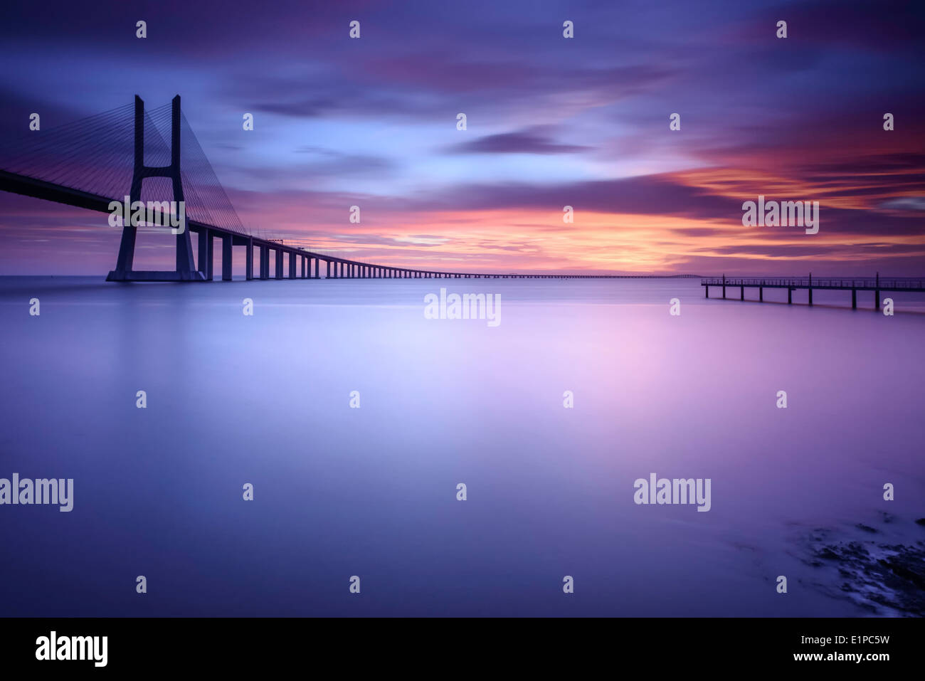 Dawn in Vasco da Gama bridge Stock Photo - Alamy