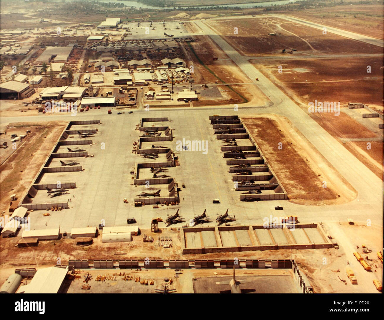 This image captures a scene from the Vietnam War, showing activity at ...