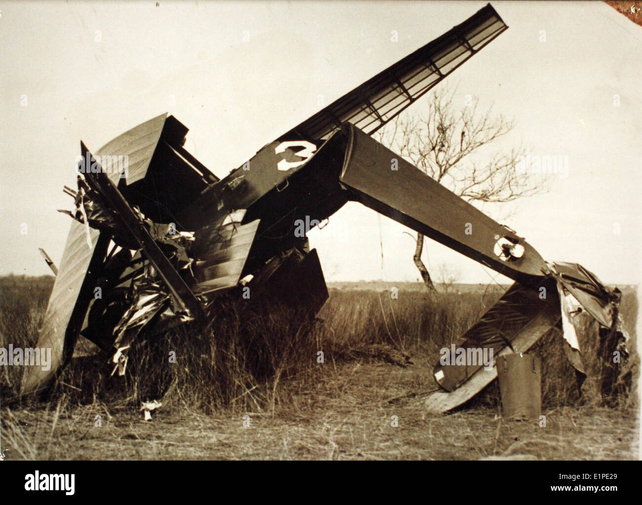This image represents the scene of a World War I aircraft crash, a ...