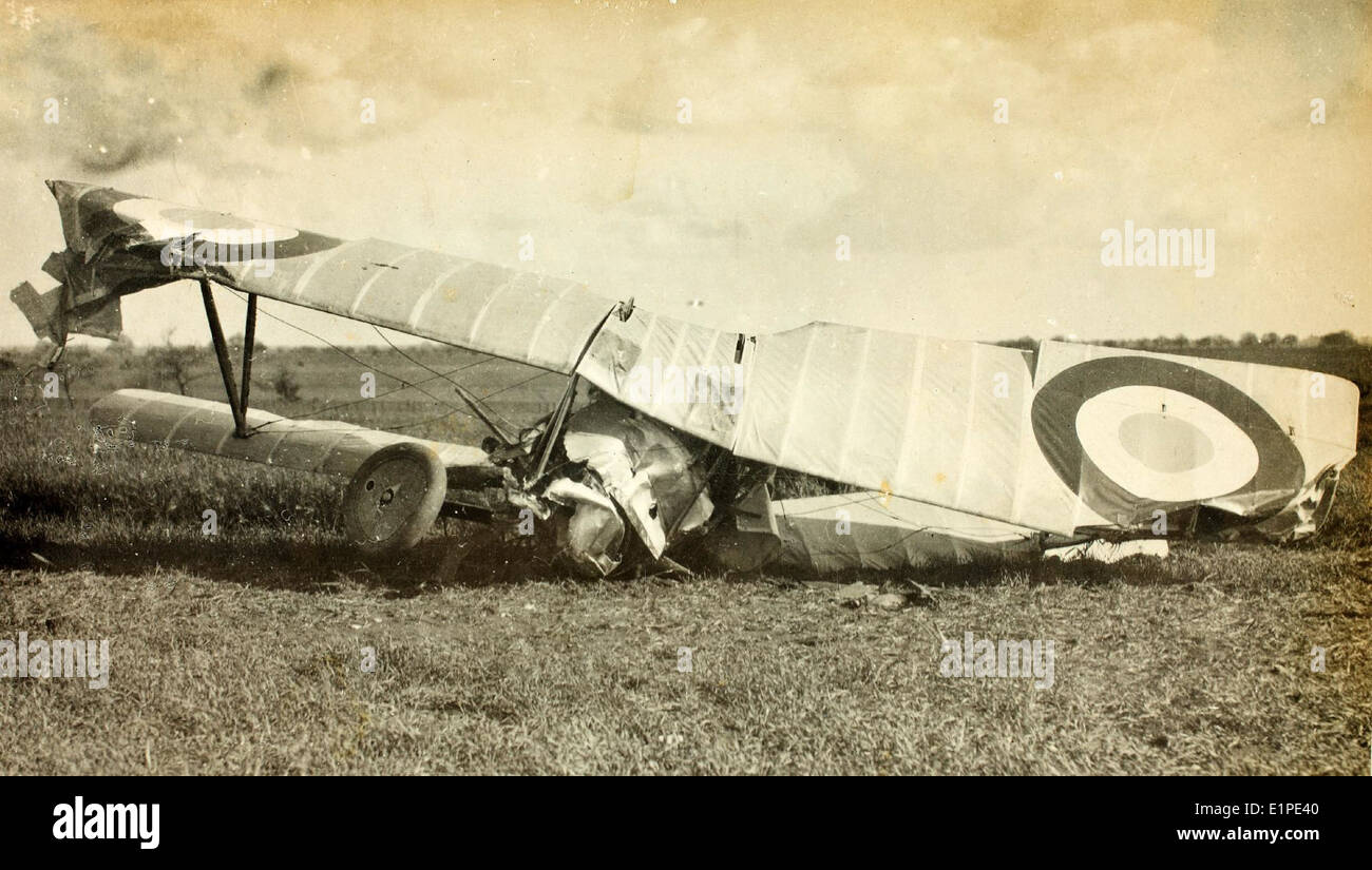 This image depicts a World War I aircraft crash, highlighting the ...