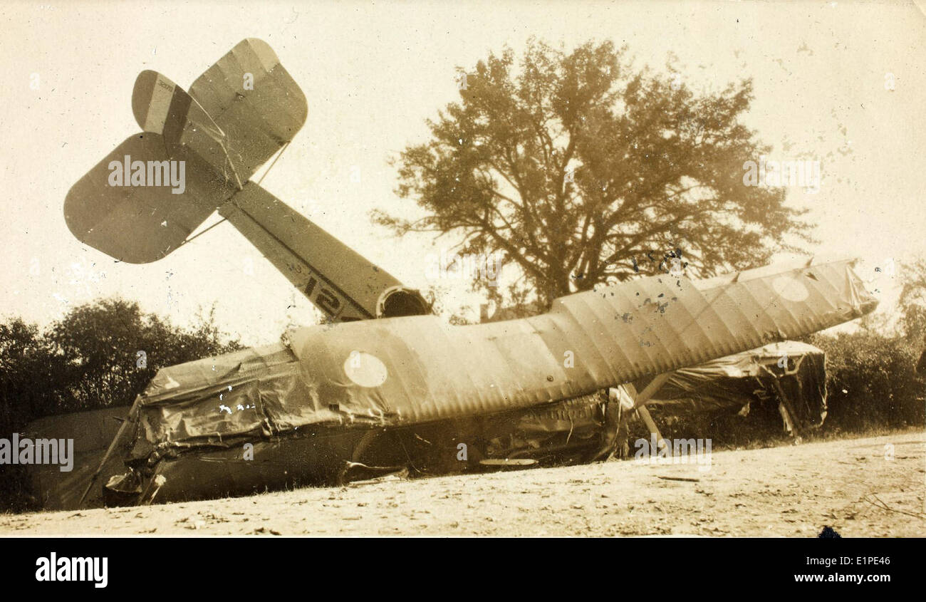 This image captures a World War I aircraft crash, illustrating the ...