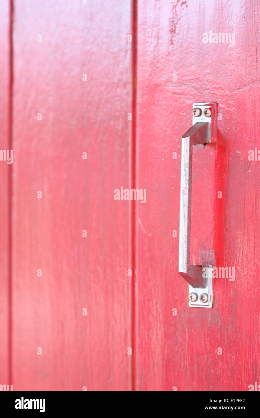 Red wood texture and handle door for the background Stock Photo - Alamy