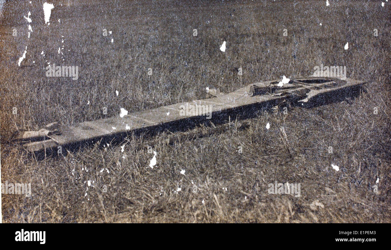 This image documents an aircraft crash during World War One, capturing ...