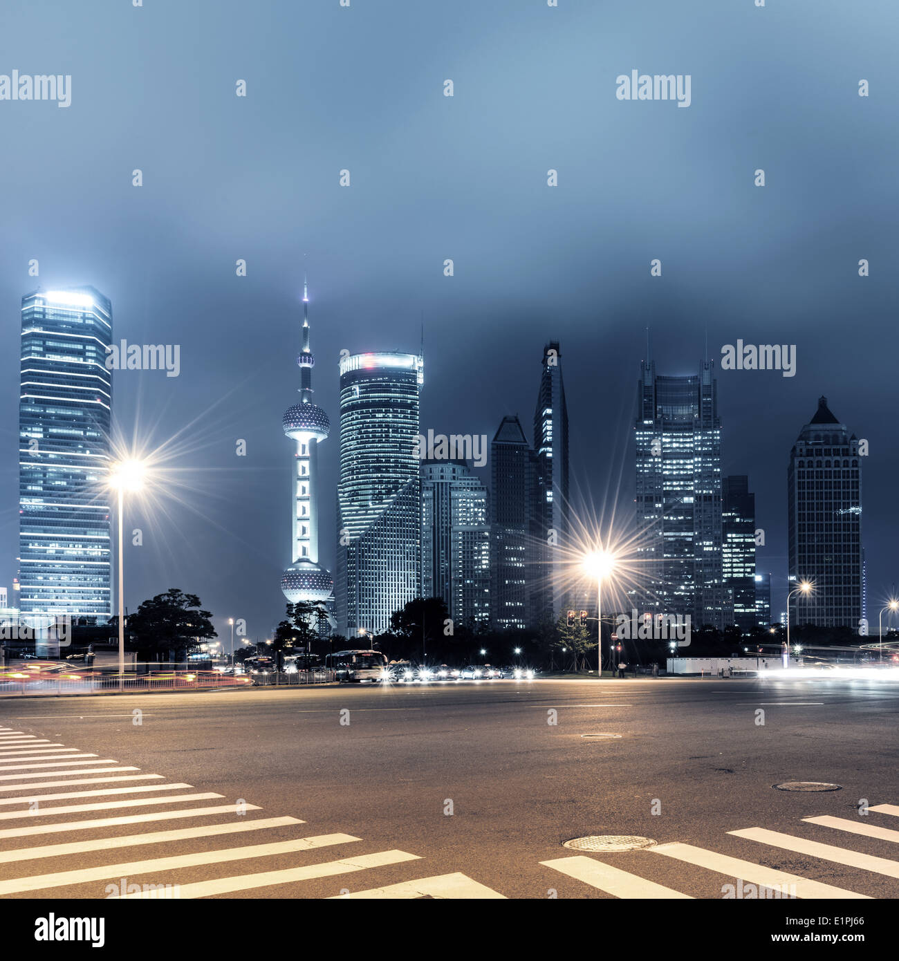 The light trails on the modern building background in shanghai china ...