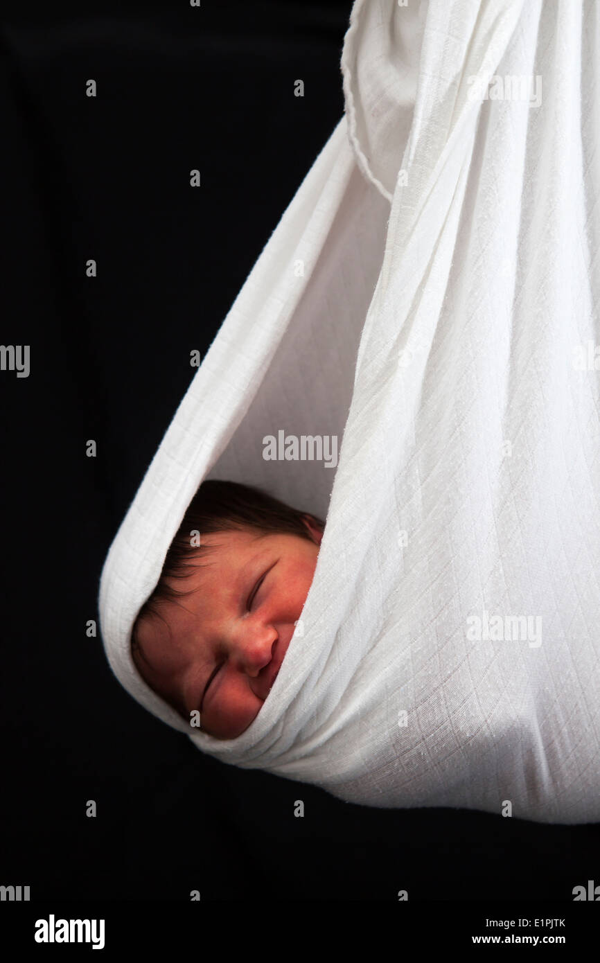 Newborn baby wrapped in cloth hi-res stock photography and images - Alamy