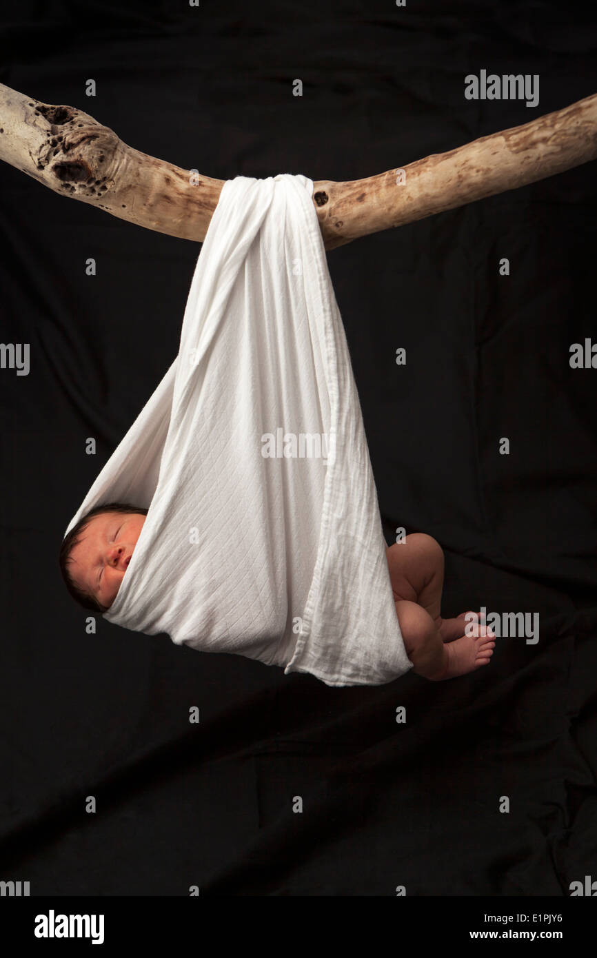 Newborn baby wrapped in cloth hi-res stock photography and images - Alamy