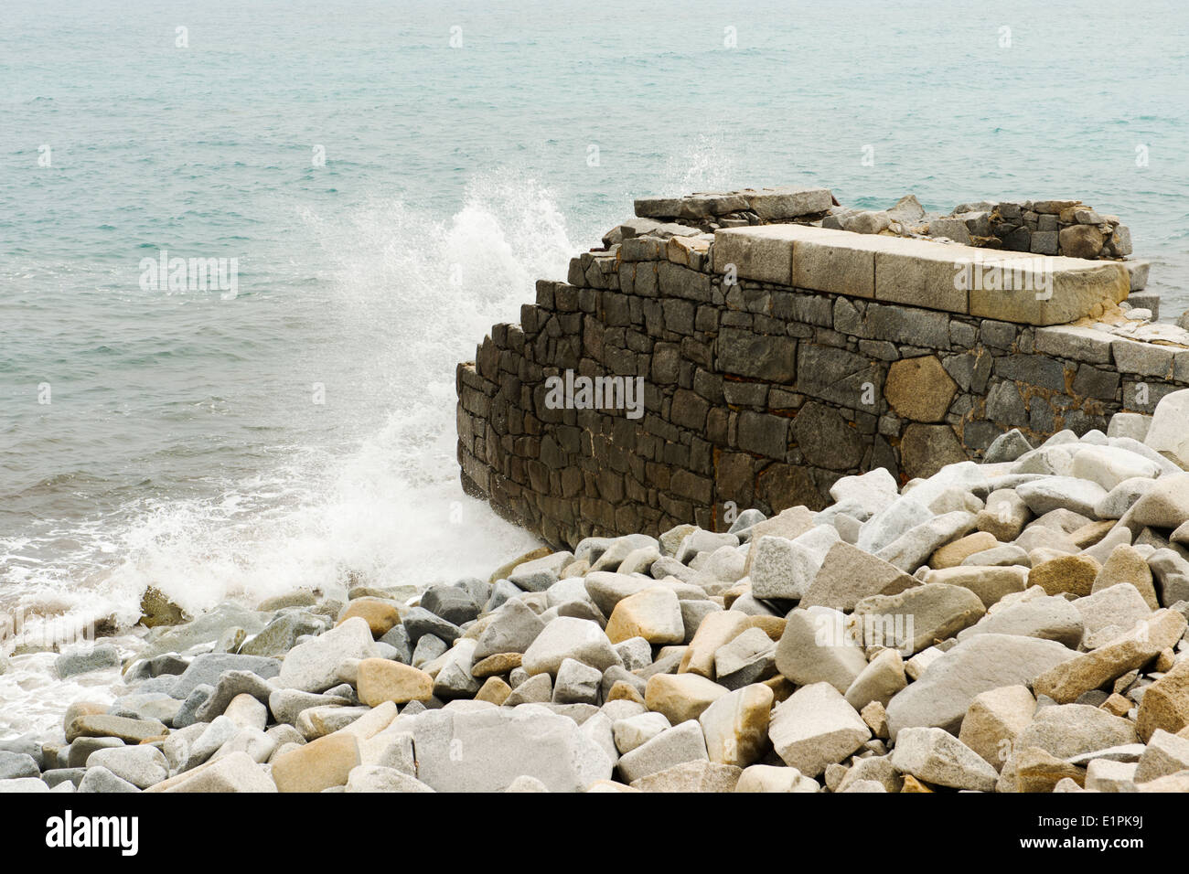 Abandoned stone jetty at Capo Carbonara, Sardinia Stock Photo - Alamy