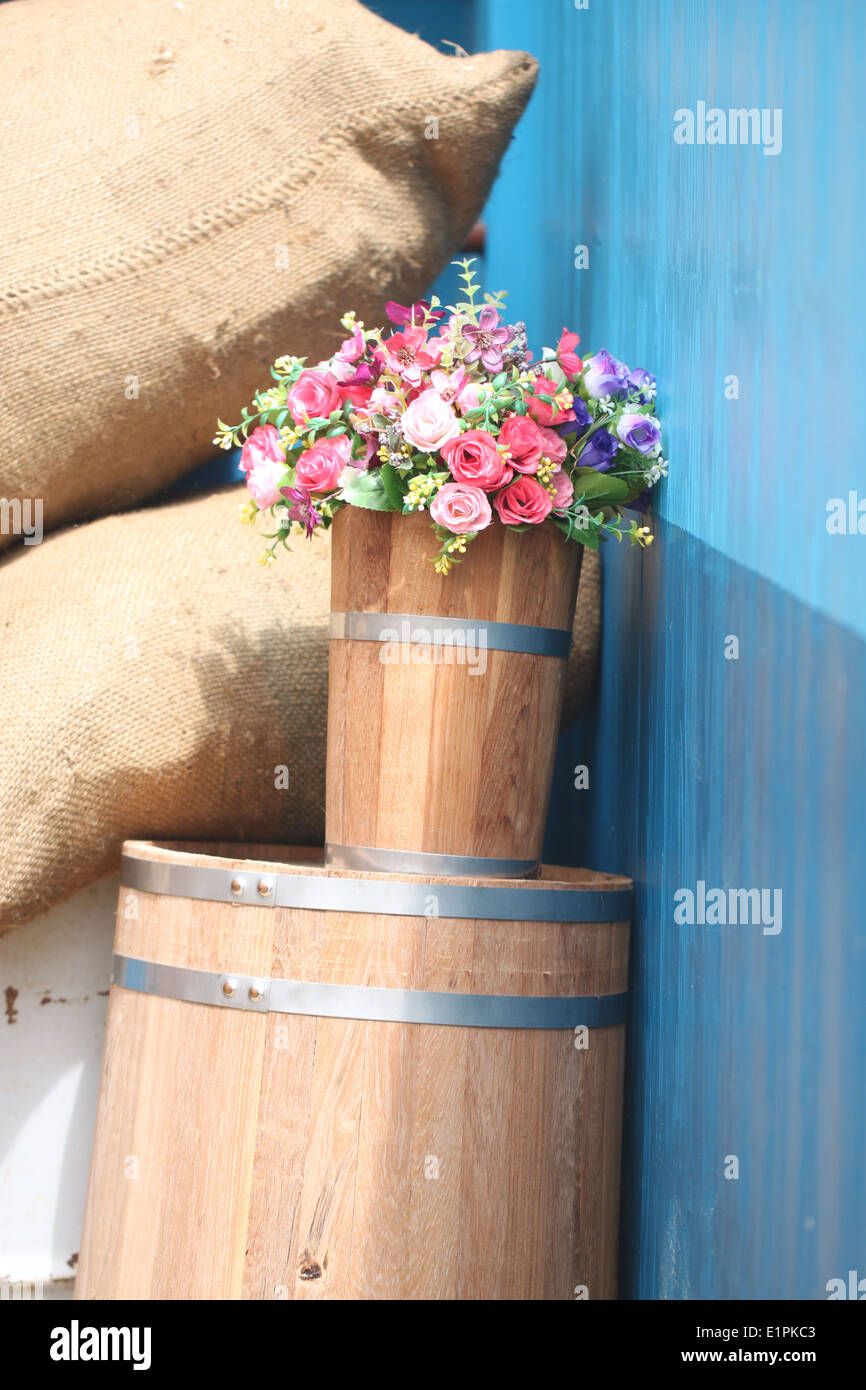 Bouquet of roses in oak barrels Stock Photo - Alamy