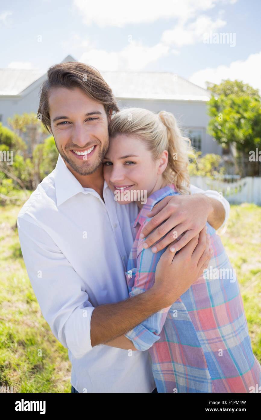 Cute couple spending time together in their garden Stock Photo - Alamy