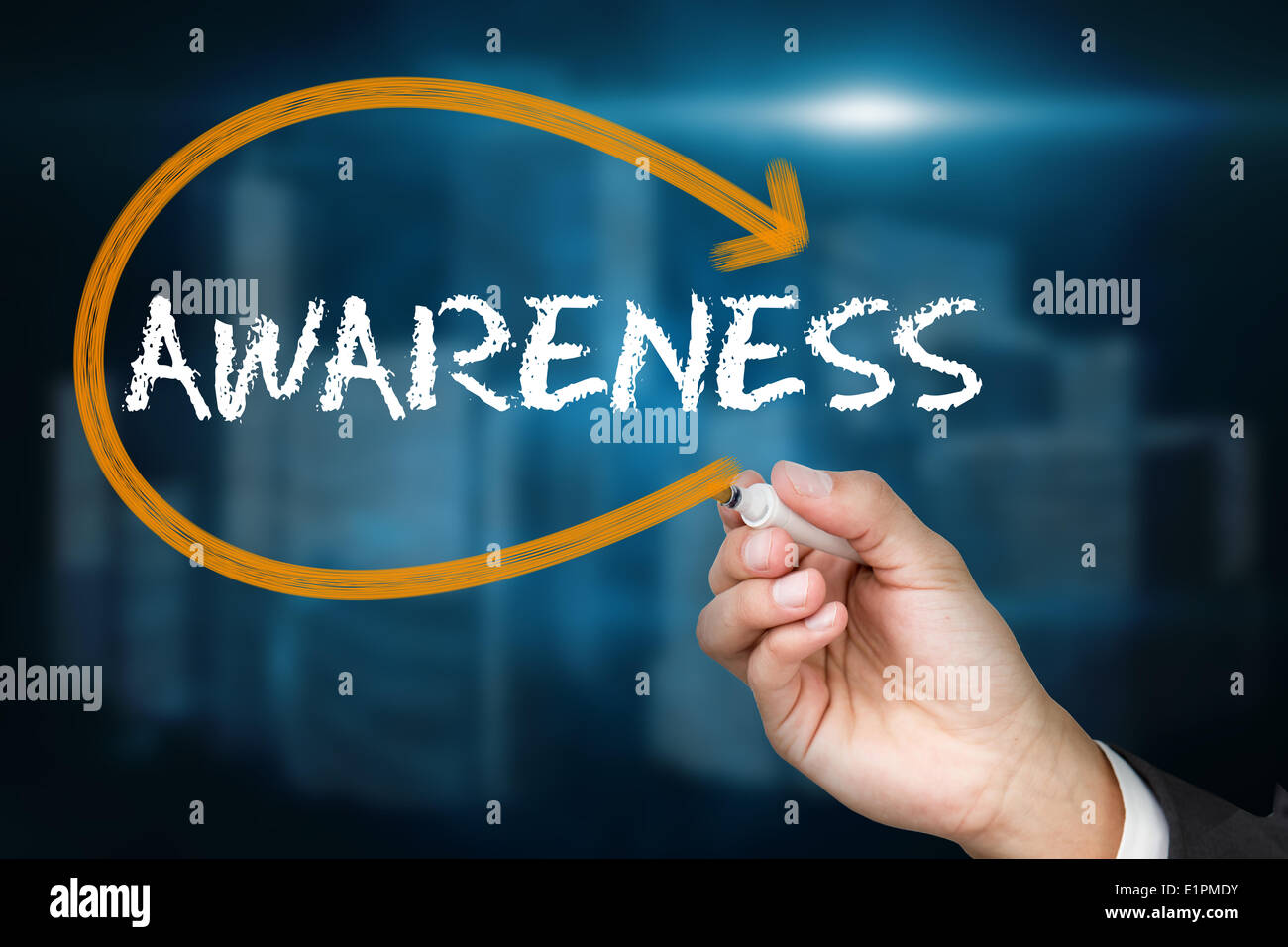 Businessman writing the word awareness Stock Photo - Alamy