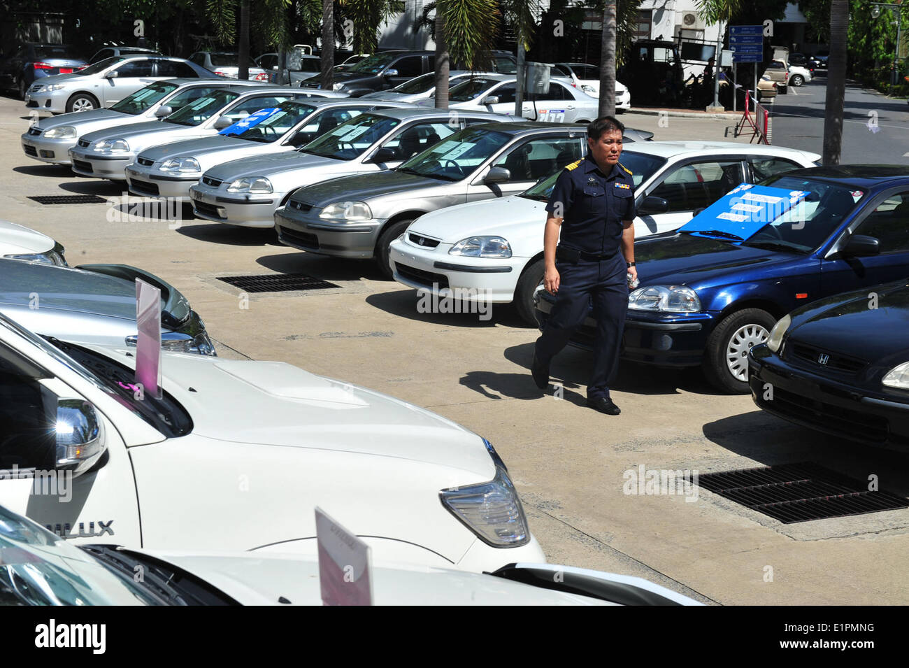 Bangkok, Thailand. 9th June, 2014. A Thai customs official walks past ...