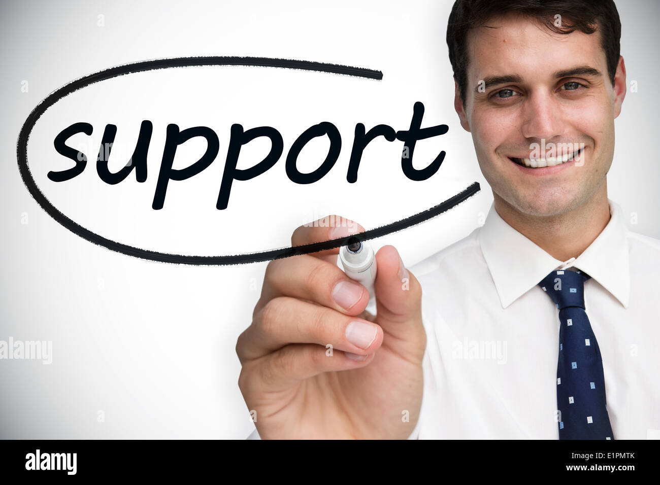 Businessman writing the word support Stock Photo - Alamy