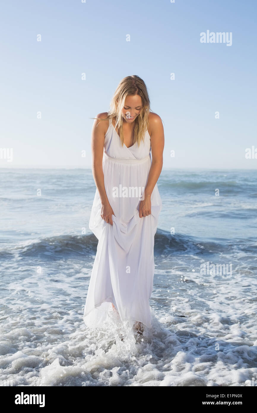 Woman in wet dress standing hi-res stock photography and images - Alamy