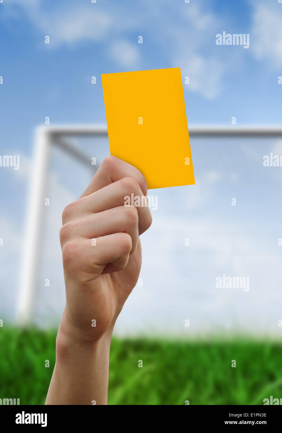 Referee hand yellow card hi-res stock photography and images - Alamy