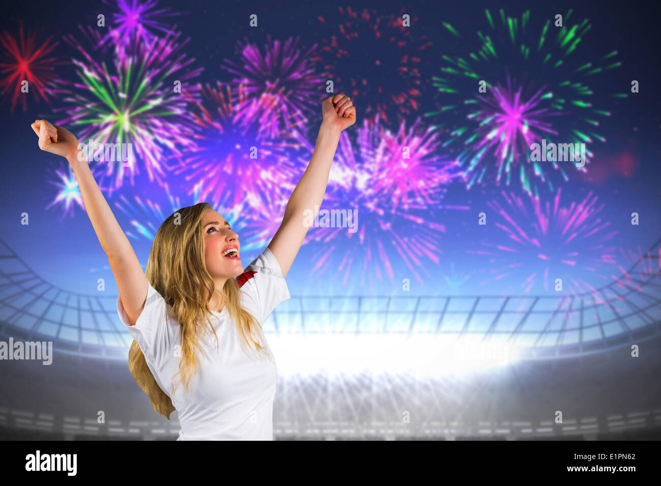 Composite image of pretty football fan in white cheering Stock Photo ...